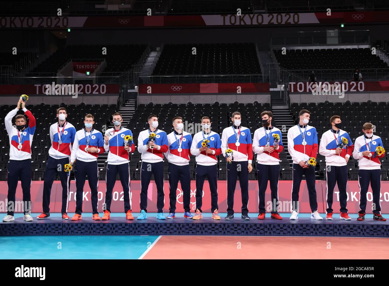 Silver medalists, Team ROC (ROC), celebrate on the podium in the ...
