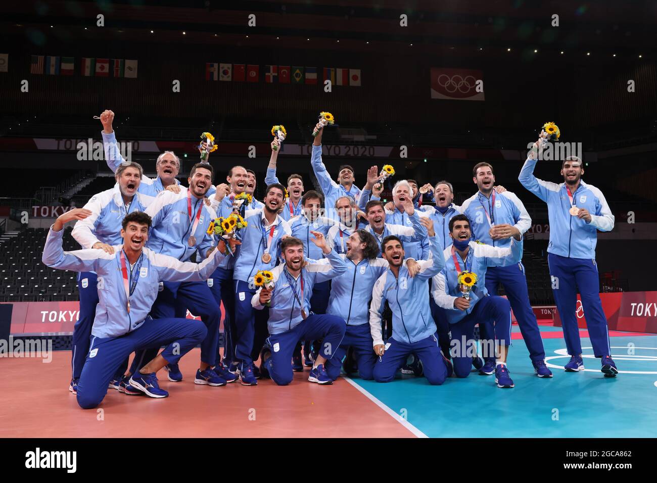 Team Argentina (ARG), celebrate winning bronze in the Volleyball - Men's Medal Ceremony during ...