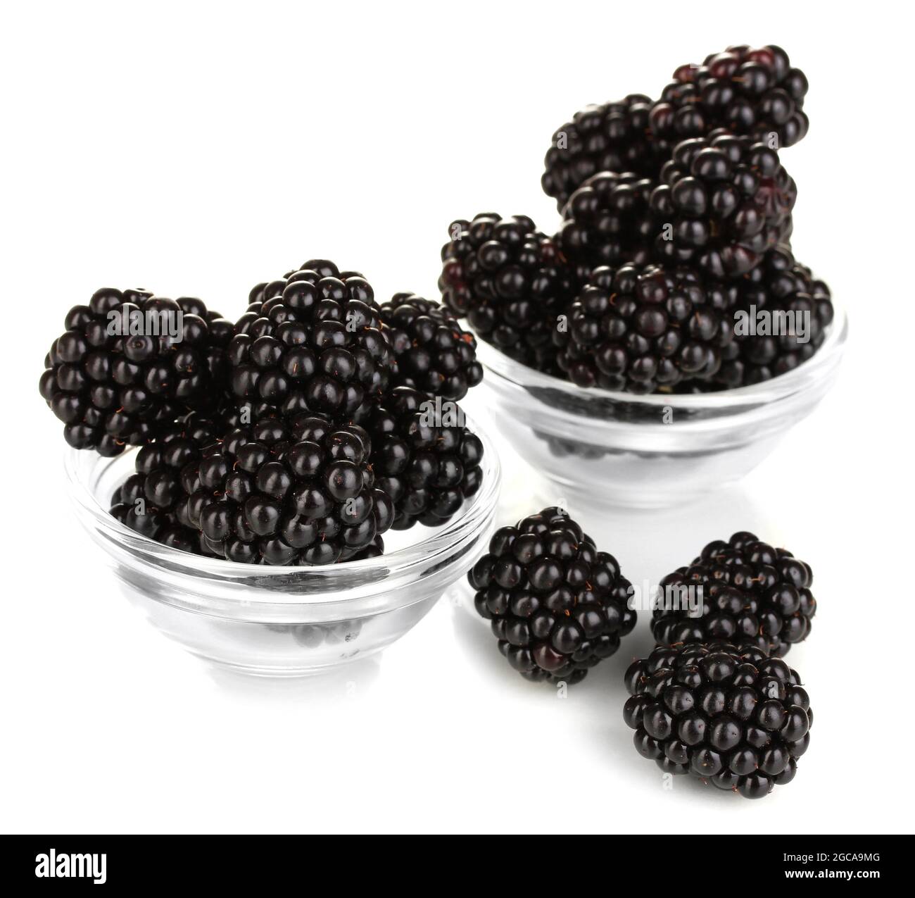Sweet blackberry in glass bowl isolated on white Stock Photo - Alamy