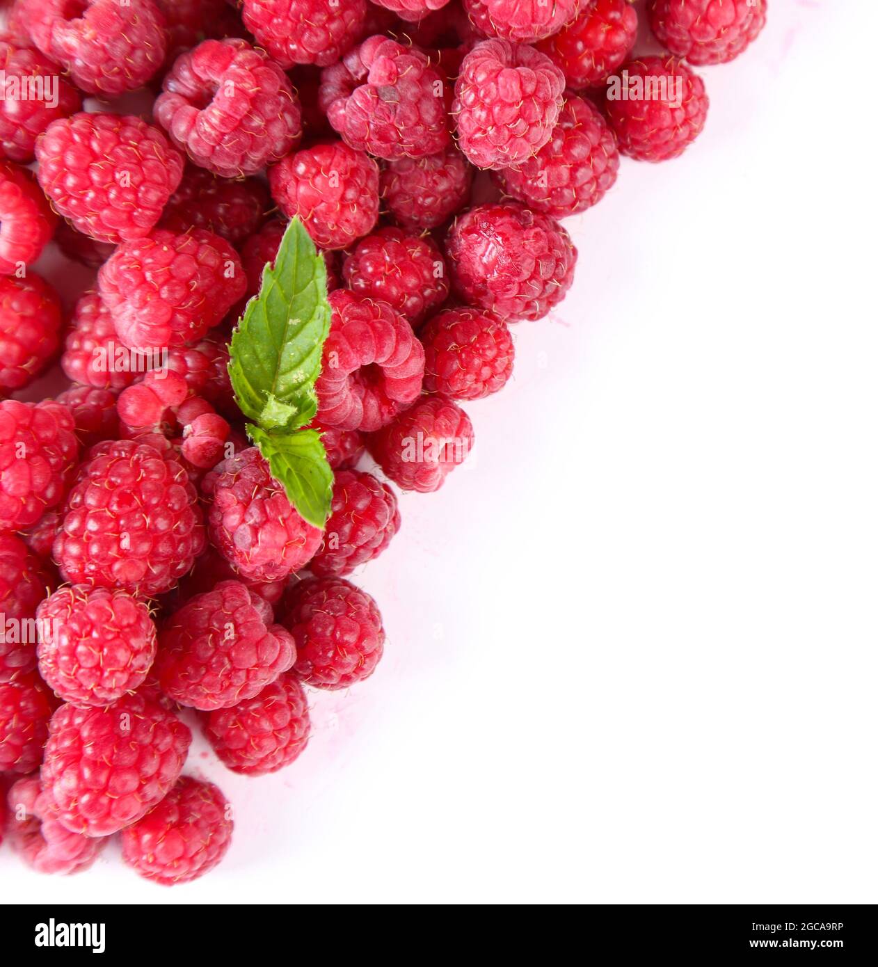 Ripe sweet raspberries isolated on white Stock Photo - Alamy