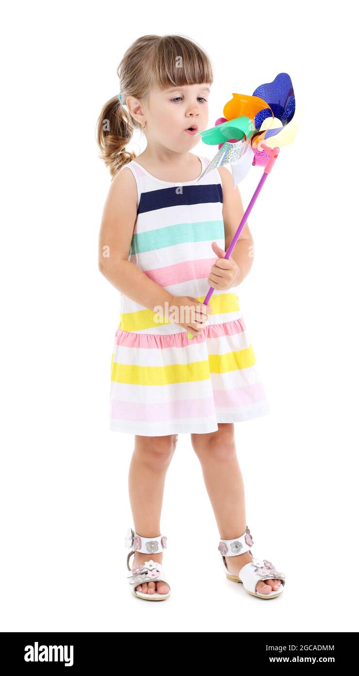 Little cute girl holding toy in her hand, isolated on white Stock Photo ...