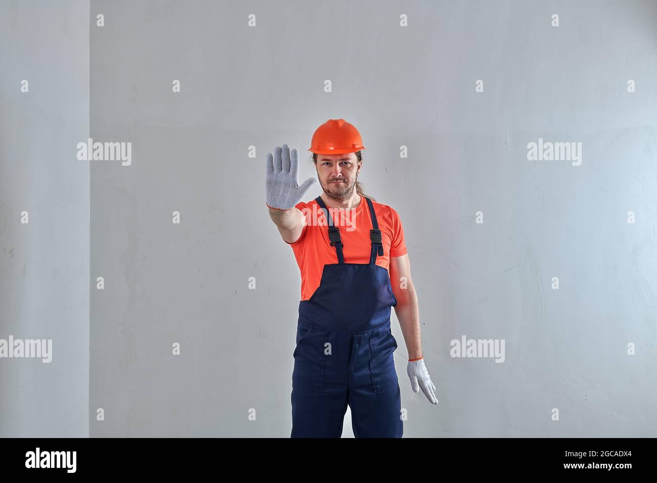 smart foreman makes an important hand gesture Stock Photo - Alamy