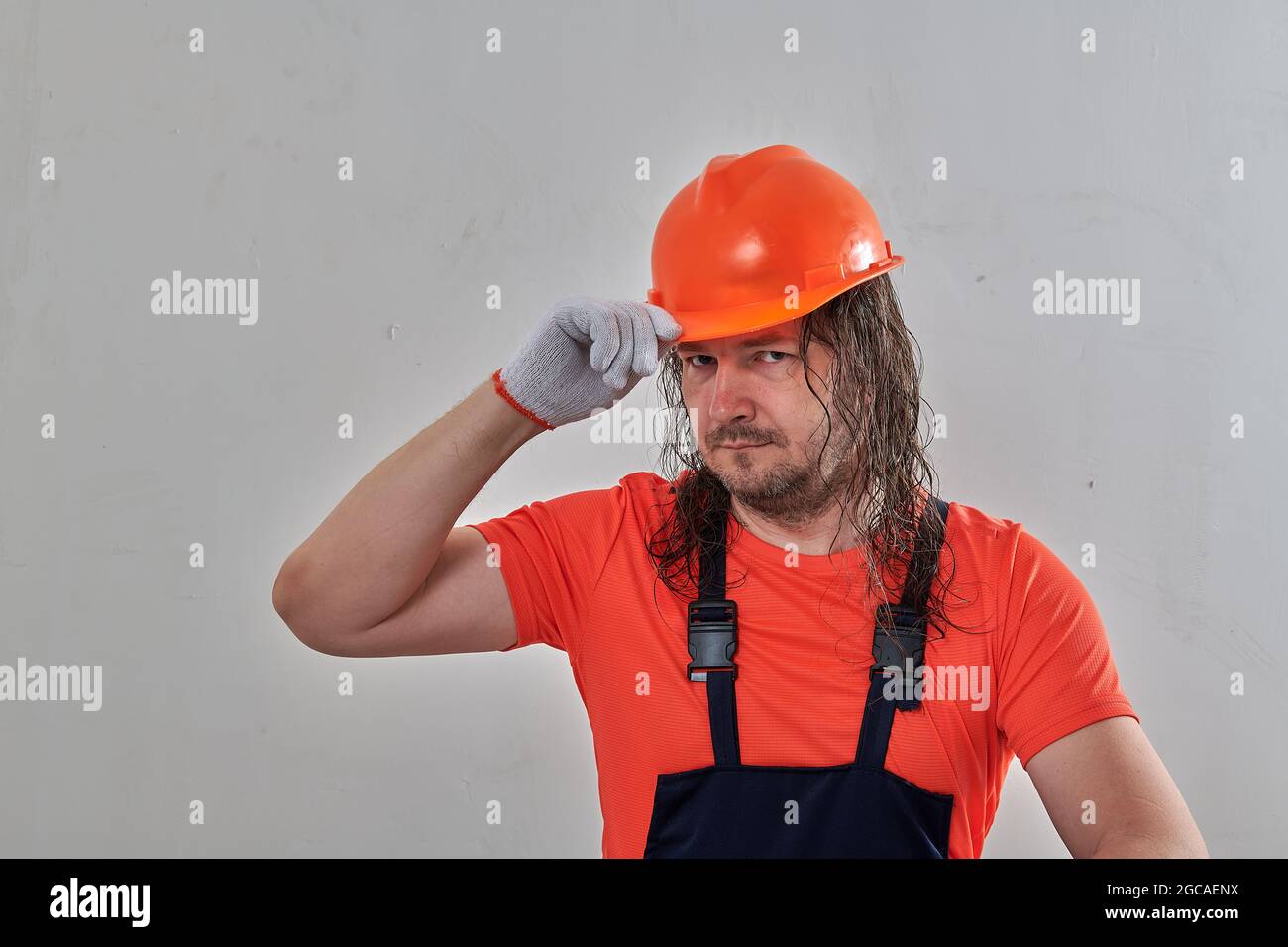 Engineer puts on helmet hi-res stock photography and images - Alamy