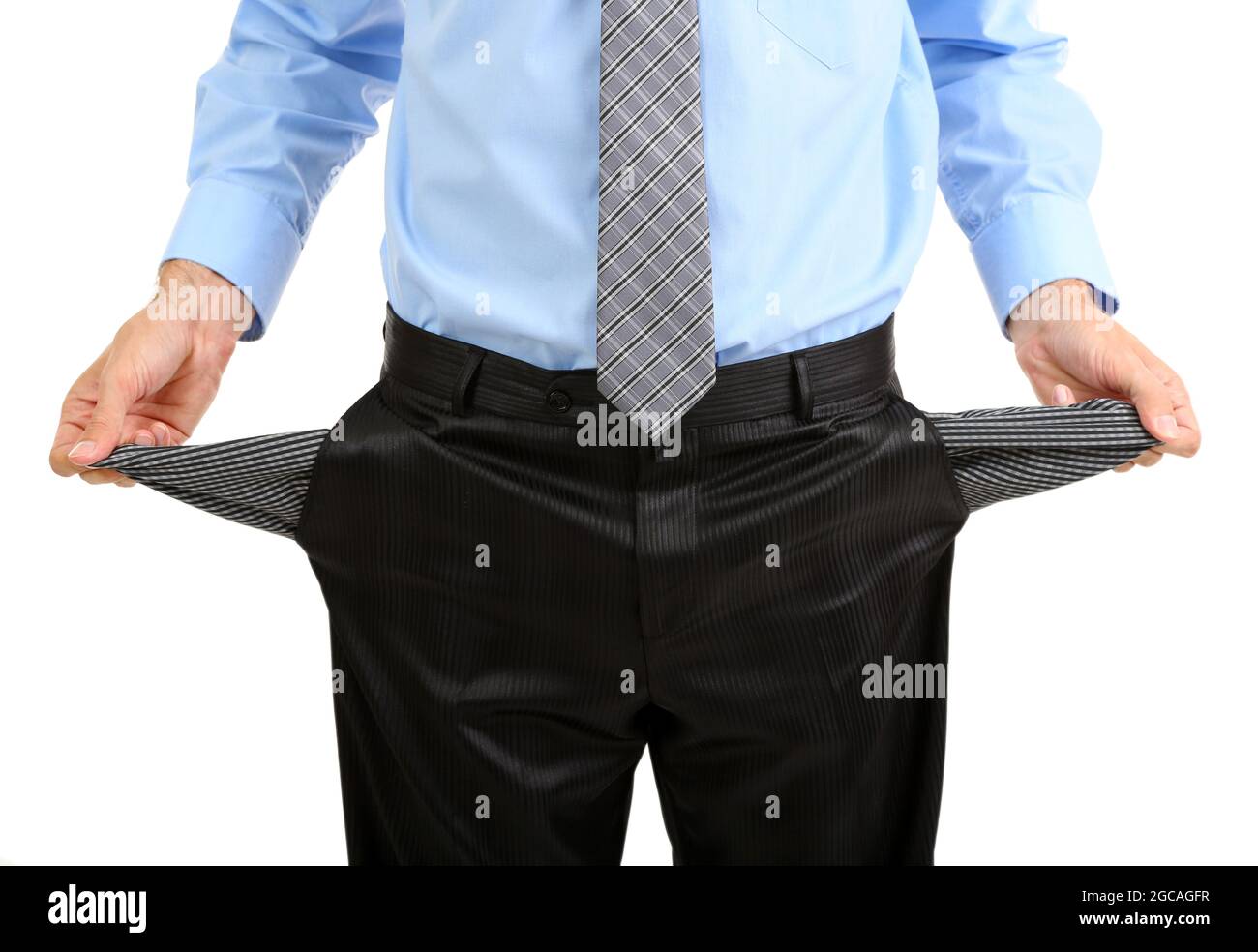 Business man showing his empty pockets, isolated on white Stock Photo ...
