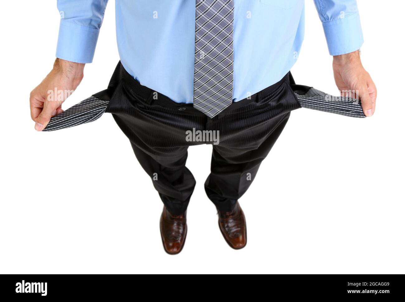 Business man showing his empty pockets, isolated on white Stock Photo ...