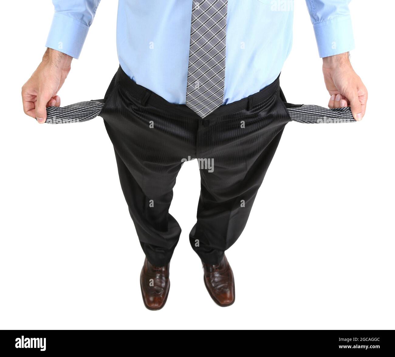 Business man showing his empty pockets, isolated on white Stock Photo ...