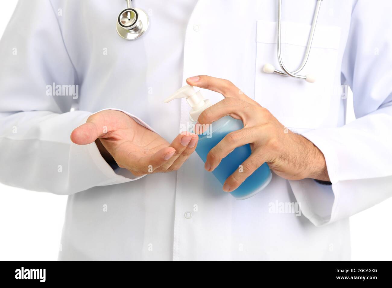 Medical doctor using sanitizer dispenser Stock Photo - Alamy