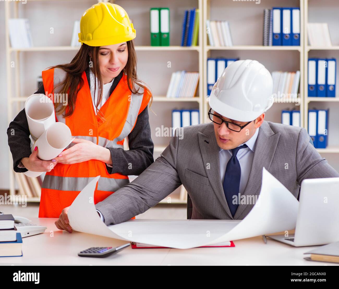 The construction foreman supervisor reviewing drawings Stock Photo - Alamy