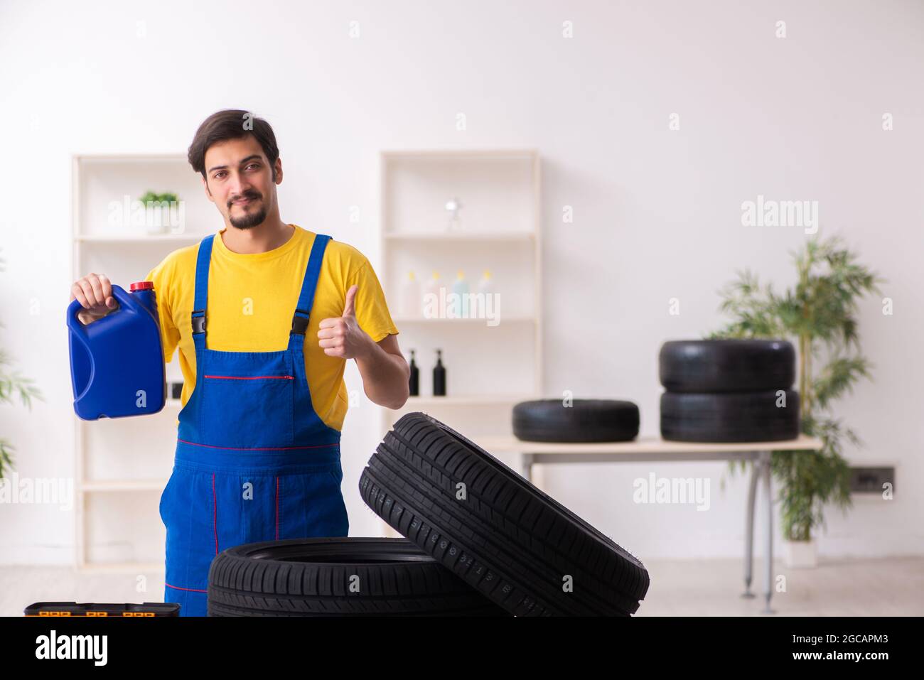 Worker giving fuel hi-res stock photography and images - Alamy