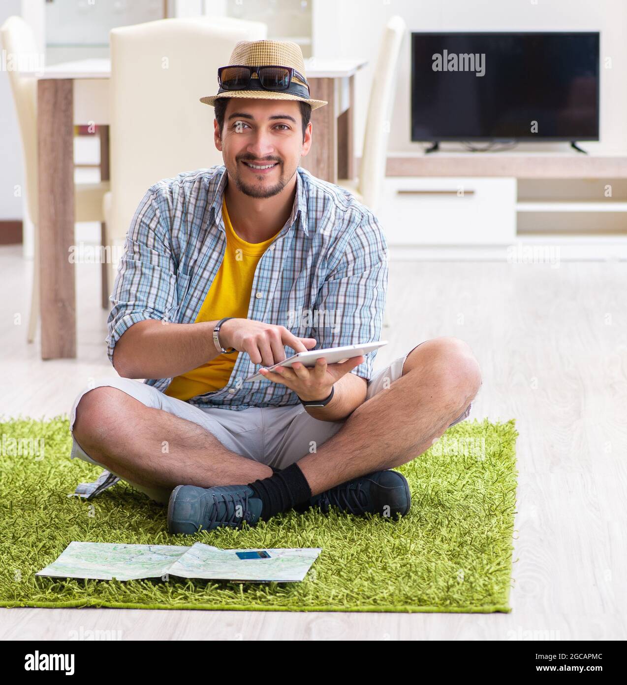 The man planning his travel with map Stock Photo - Alamy