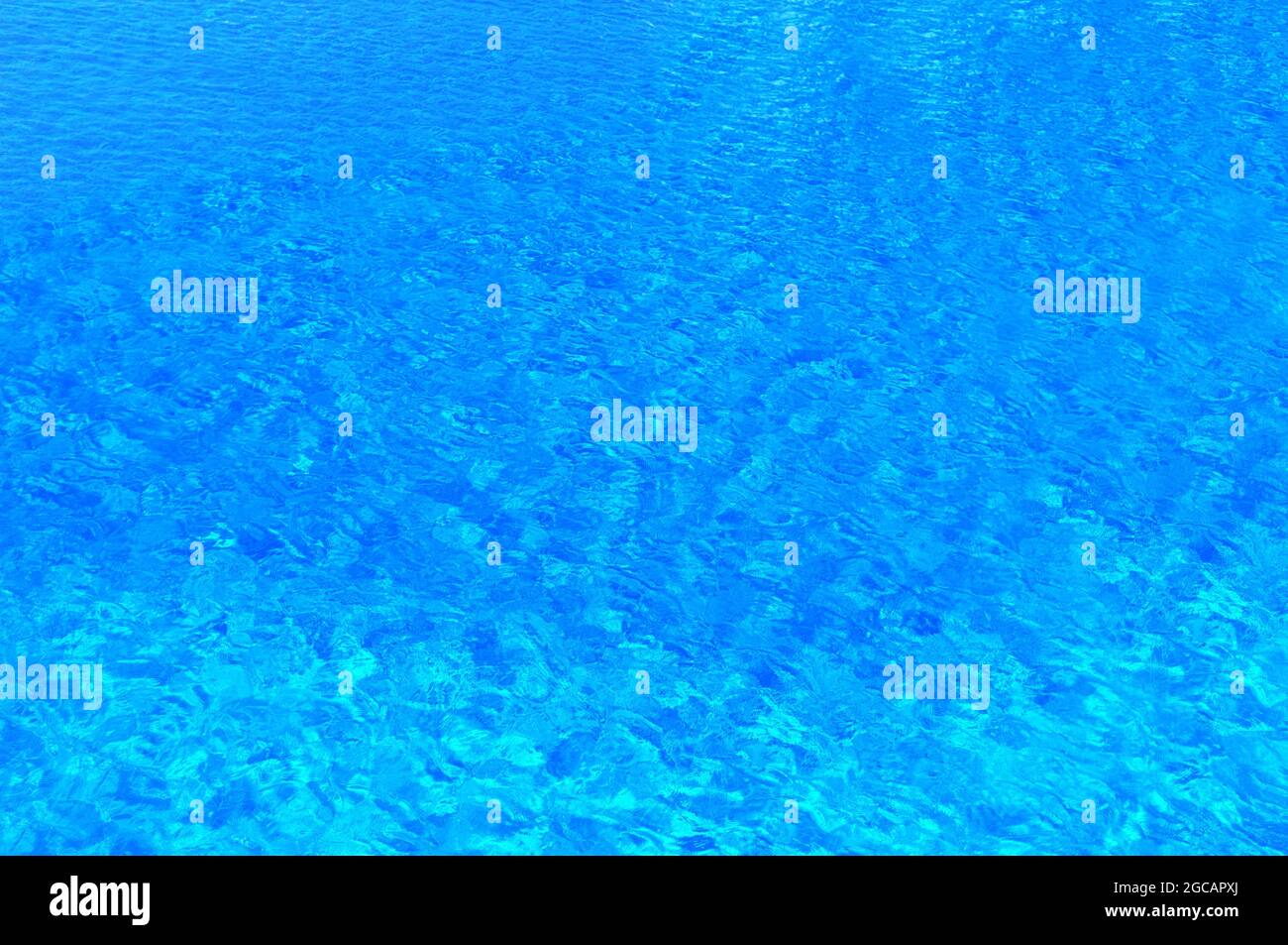 Blue water in swimming pool Stock Photo - Alamy