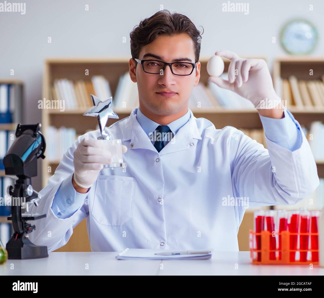 The doctor scientist receiving prize for his research discovery Stock ...