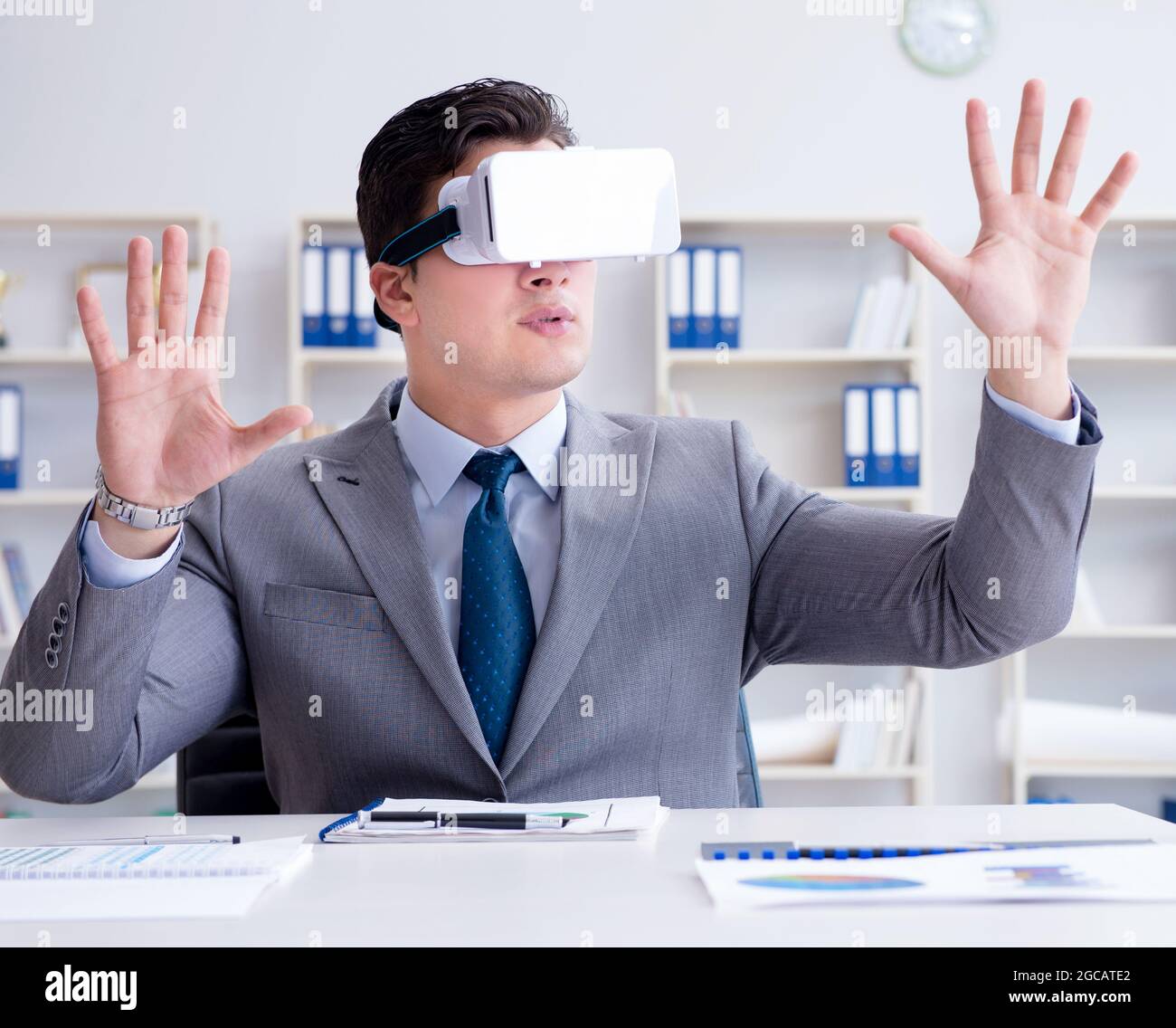 The businessman with virtual reality glasses in the office Stock Photo ...