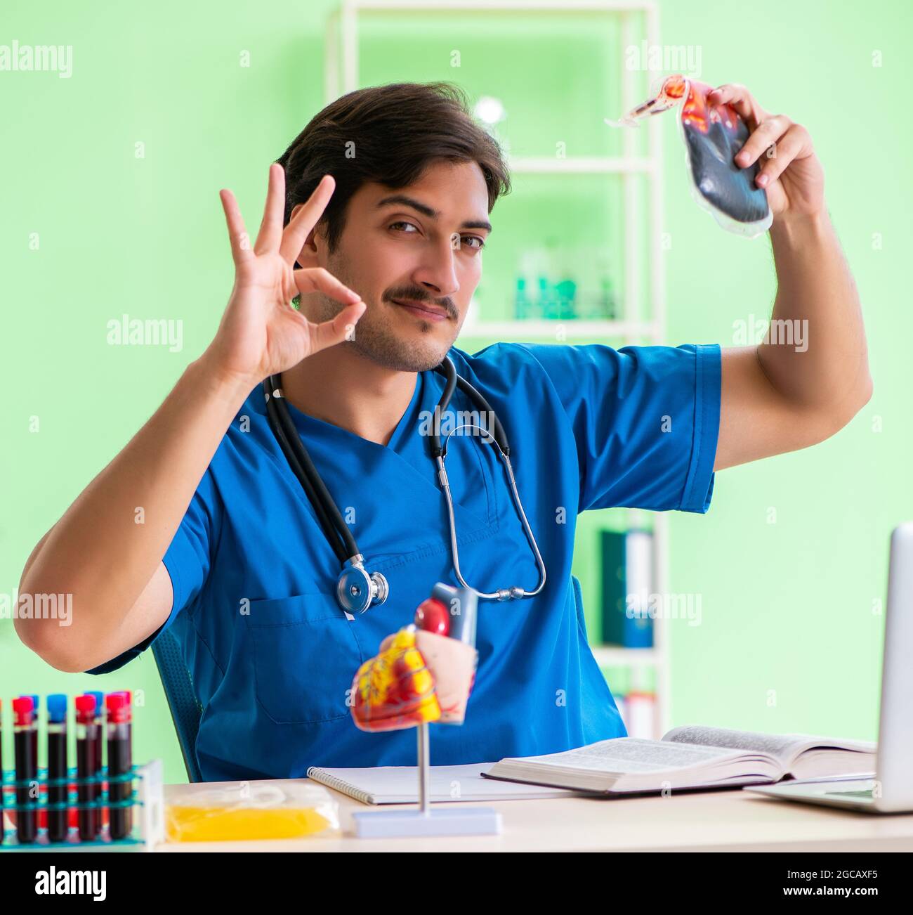 The doctor doing blood analysis in the lab Stock Photo - Alamy