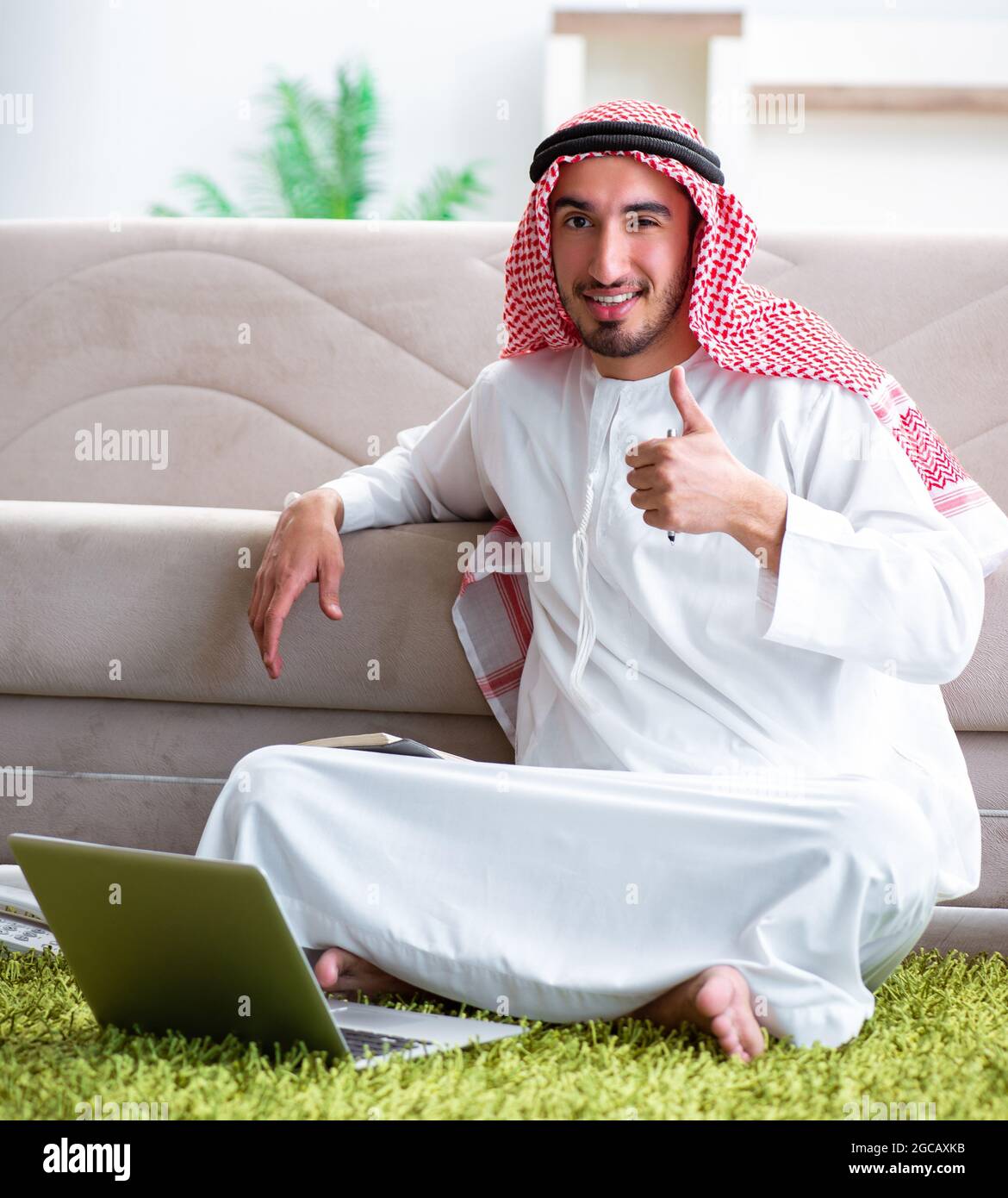 The arab man working at home on his work Stock Photo - Alamy