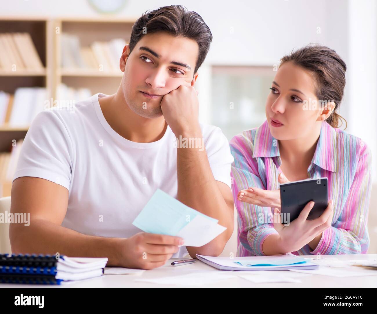 The young family discussing family finances Stock Photo - Alamy