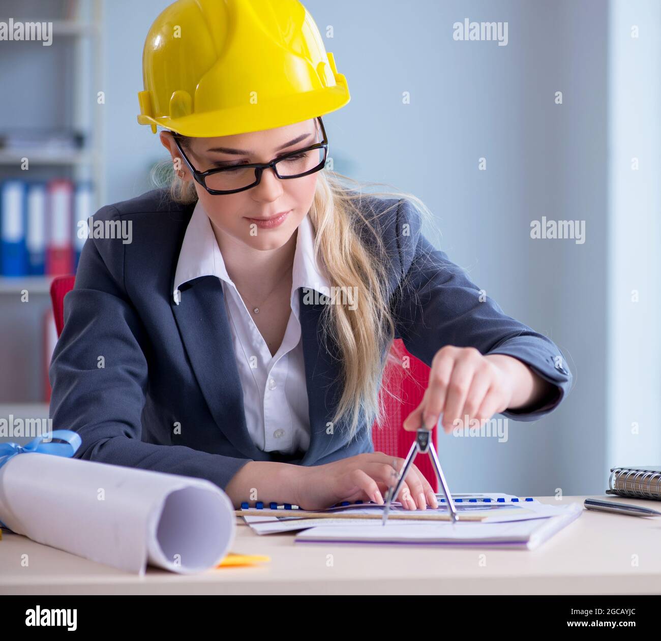 The woman architect working on the project Stock Photo - Alamy