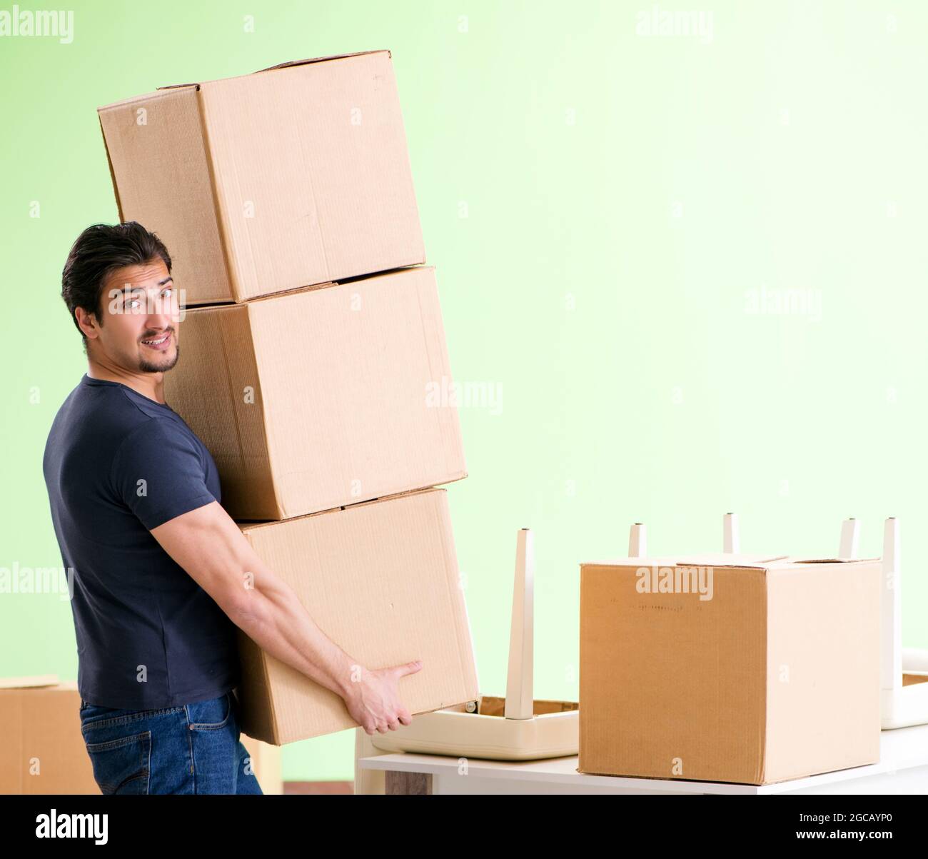 The man moving house with boxes Stock Photo - Alamy