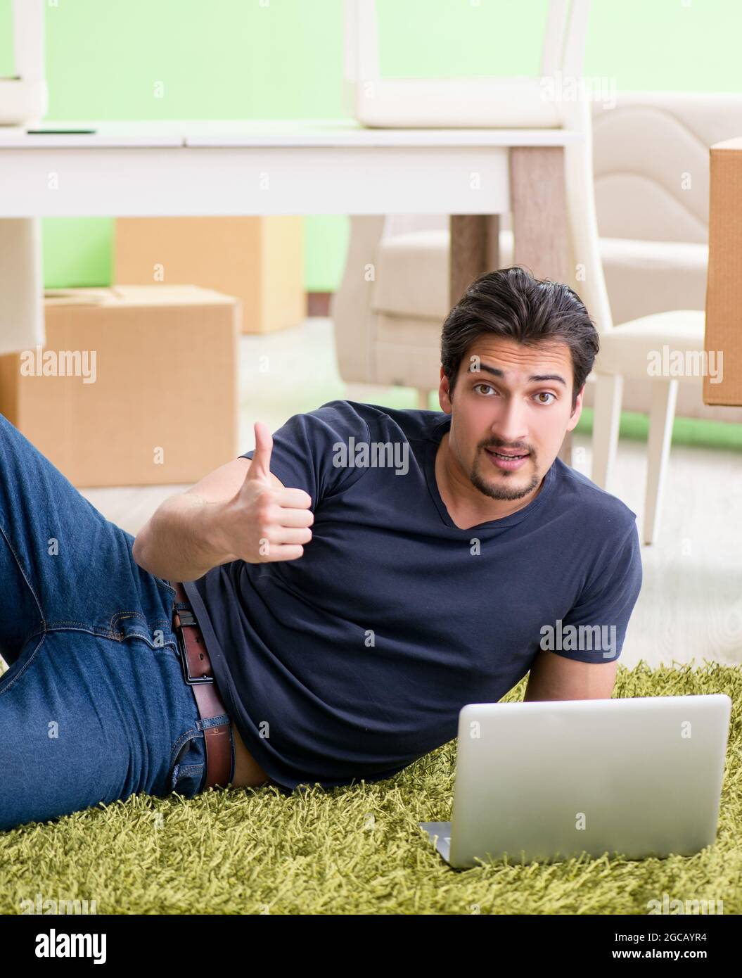 The man moving house with boxes Stock Photo - Alamy
