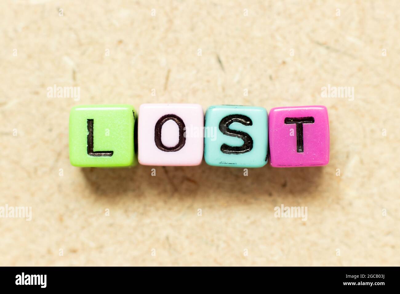 Color alphabet letter block in word lost on wood background Stock Photo ...