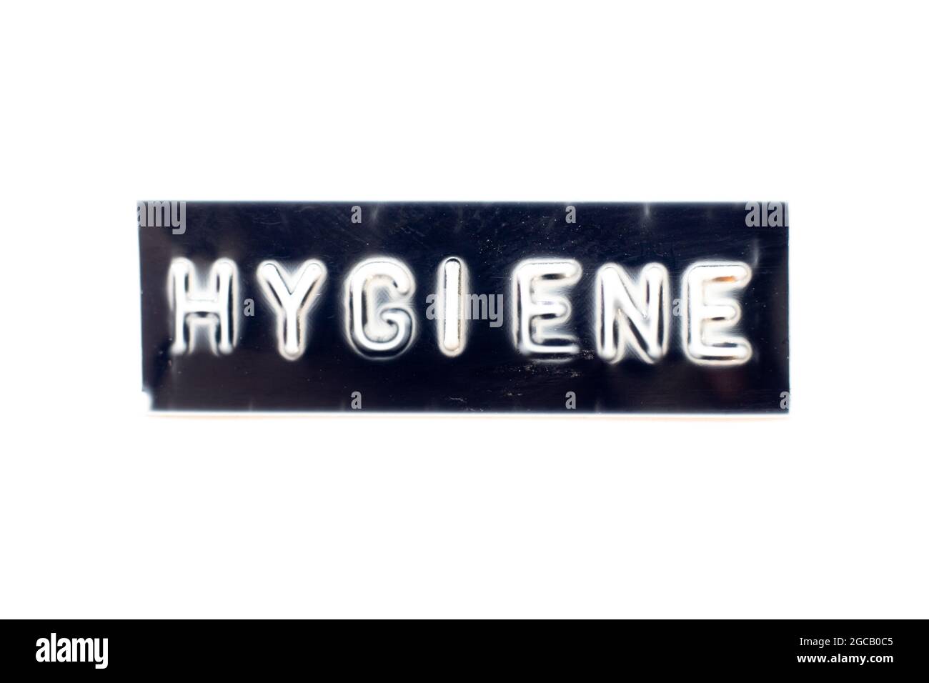 Embossed letter in word hygiene on black banner with white background ...