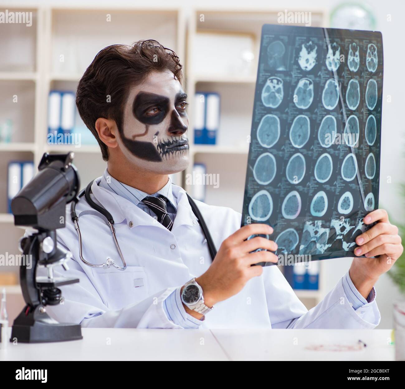 The scary monster doctor working in lab Stock Photo - Alamy