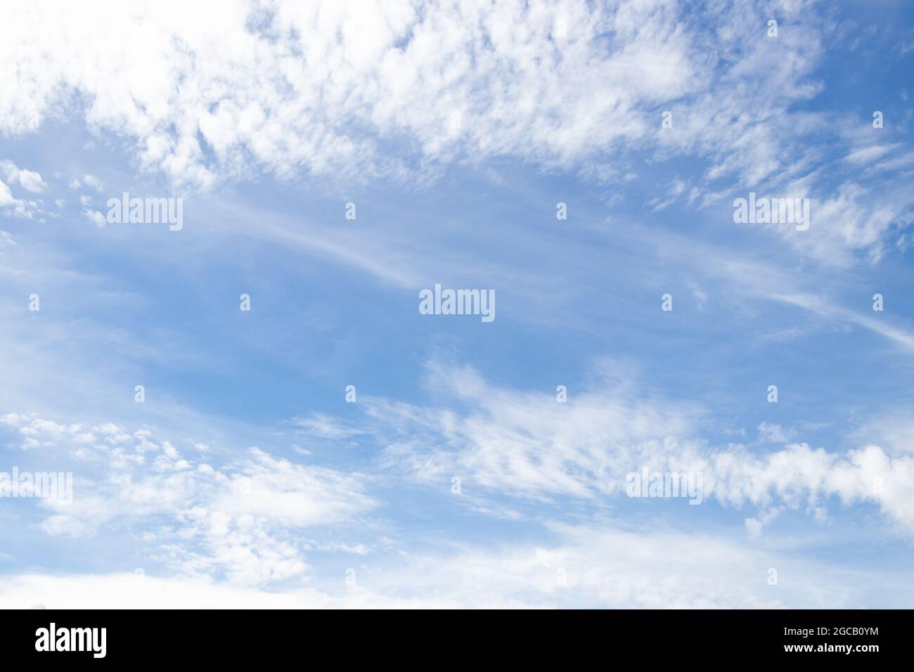 Clear blue color sky with white cloud background Stock Photo - Alamy