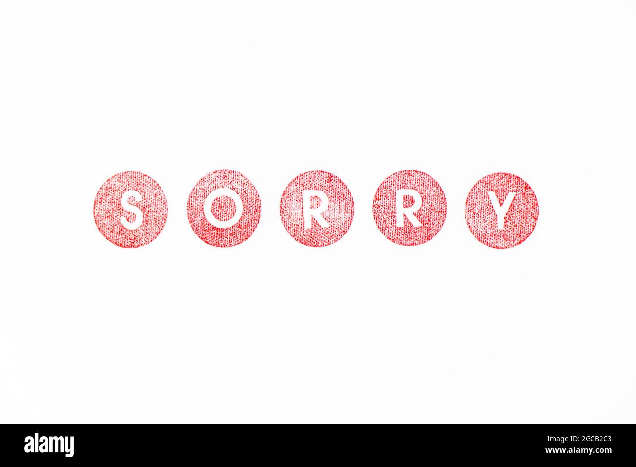 Red color rubber stamp in word sorry on white paper background Stock ...