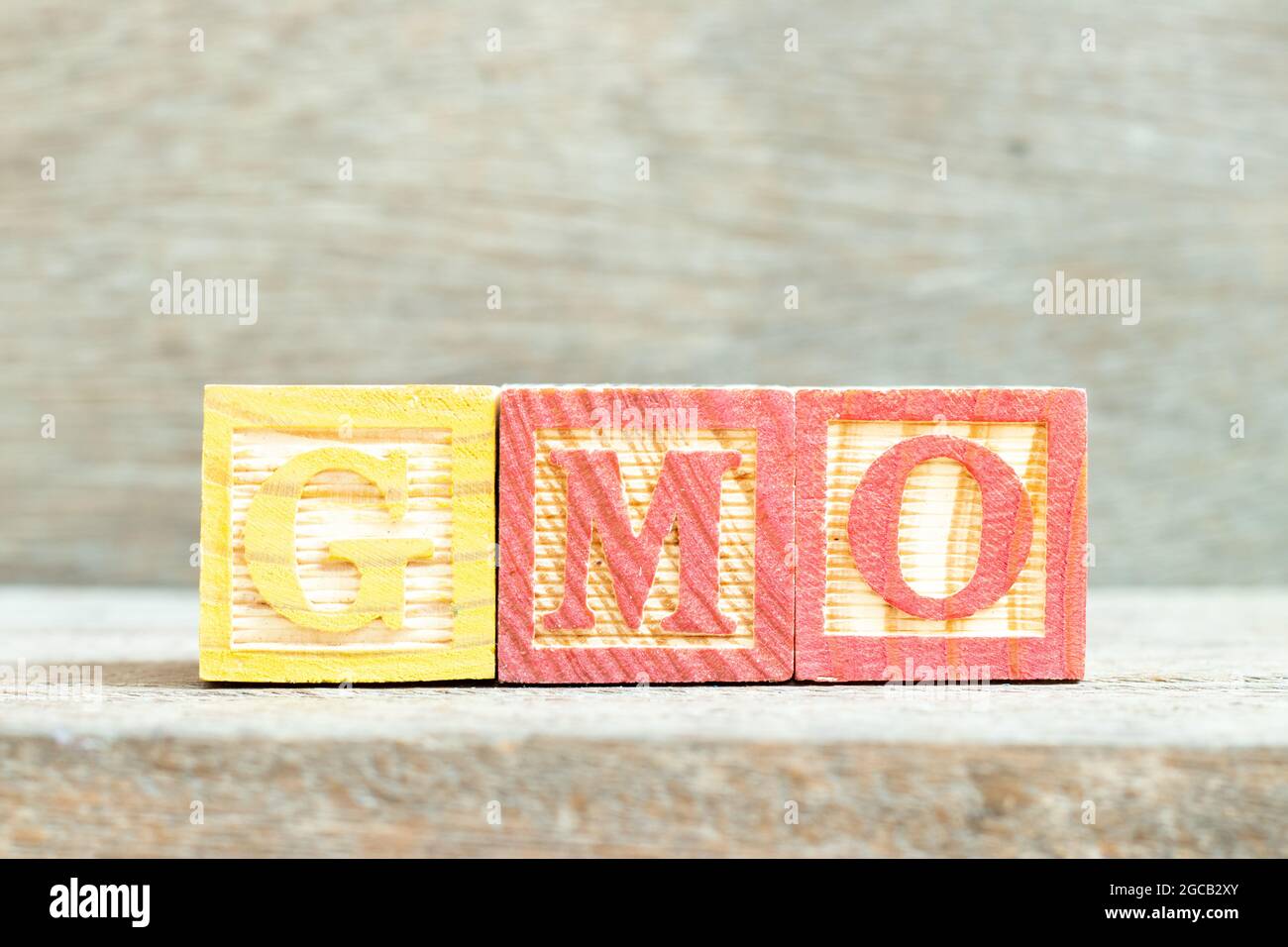 Color alphabet letter block in word GMO (abbreviation of Genetically ...