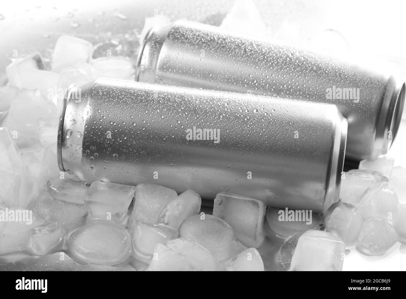 Metal cans of beer with ice cubes, close up Stock Photo - Alamy