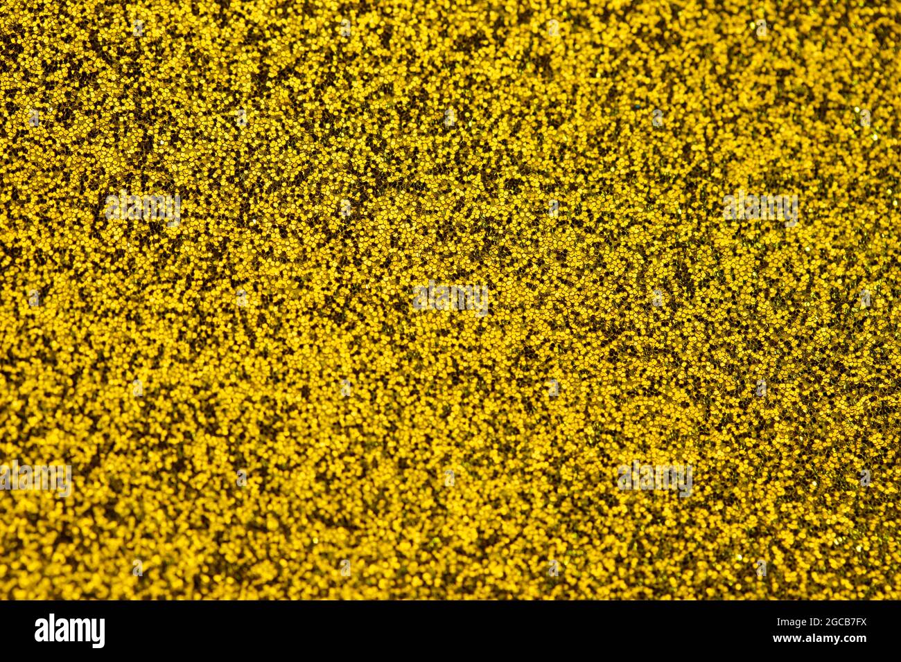 Shimmering gold glitter macro texture background with vibrant autumn ... Shimmering gold glitter macro texture background with vibrant autumn ...