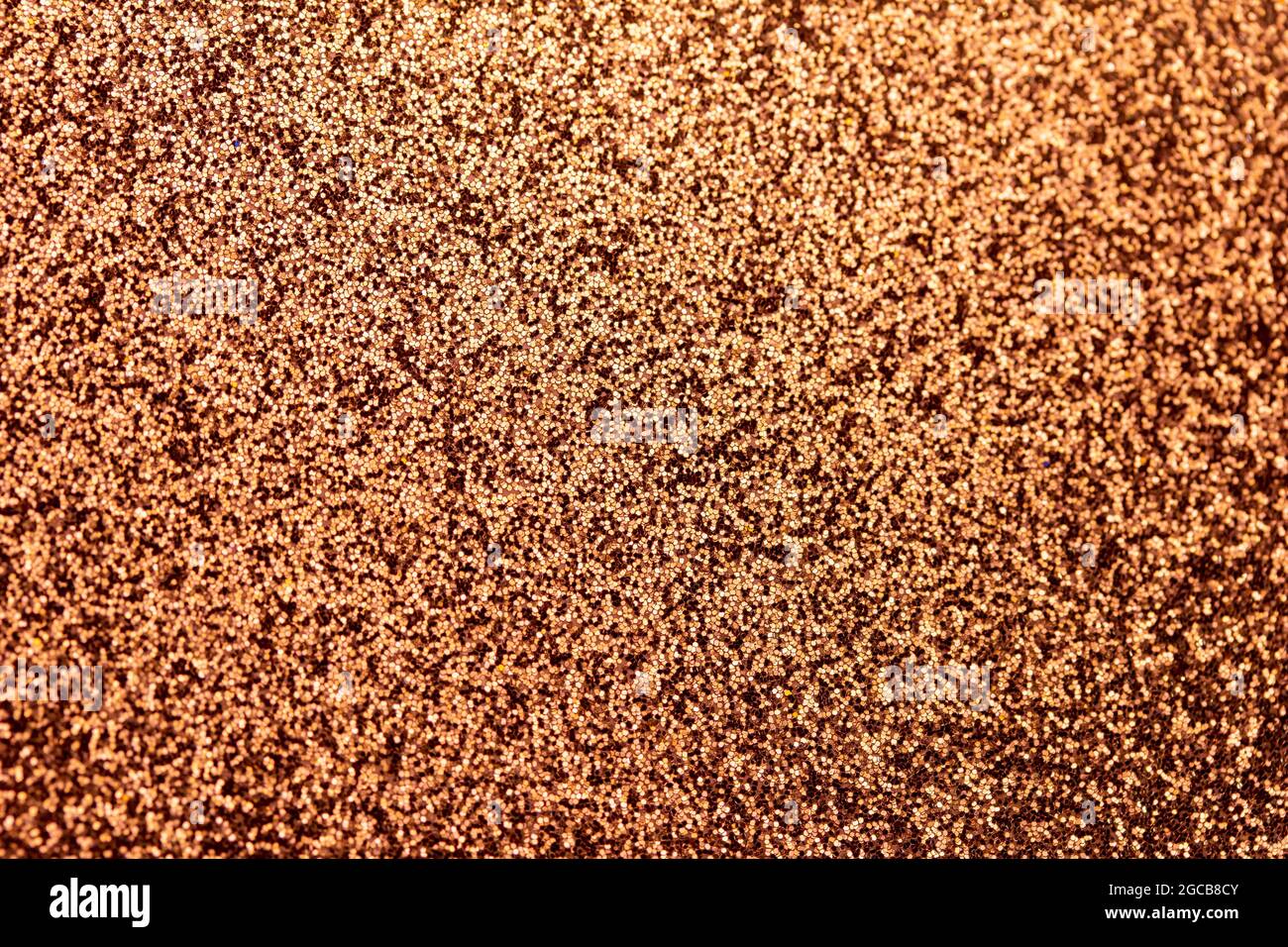 Shimmering gold glitter macro texture background with vibrant autumn ... Shimmering gold glitter macro texture background with vibrant autumn ...