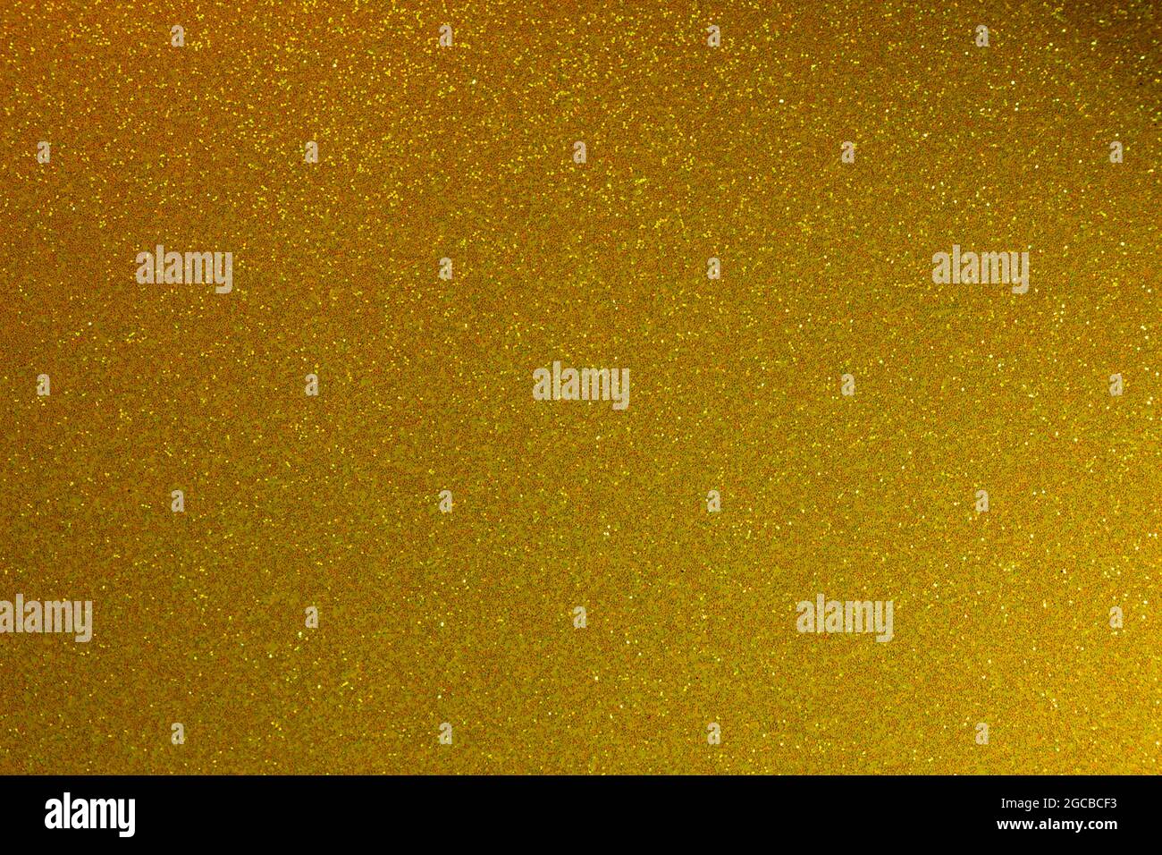 Shimmering gold glitter macro texture background with vibrant autumn ... Shimmering gold glitter macro texture background with vibrant autumn ...