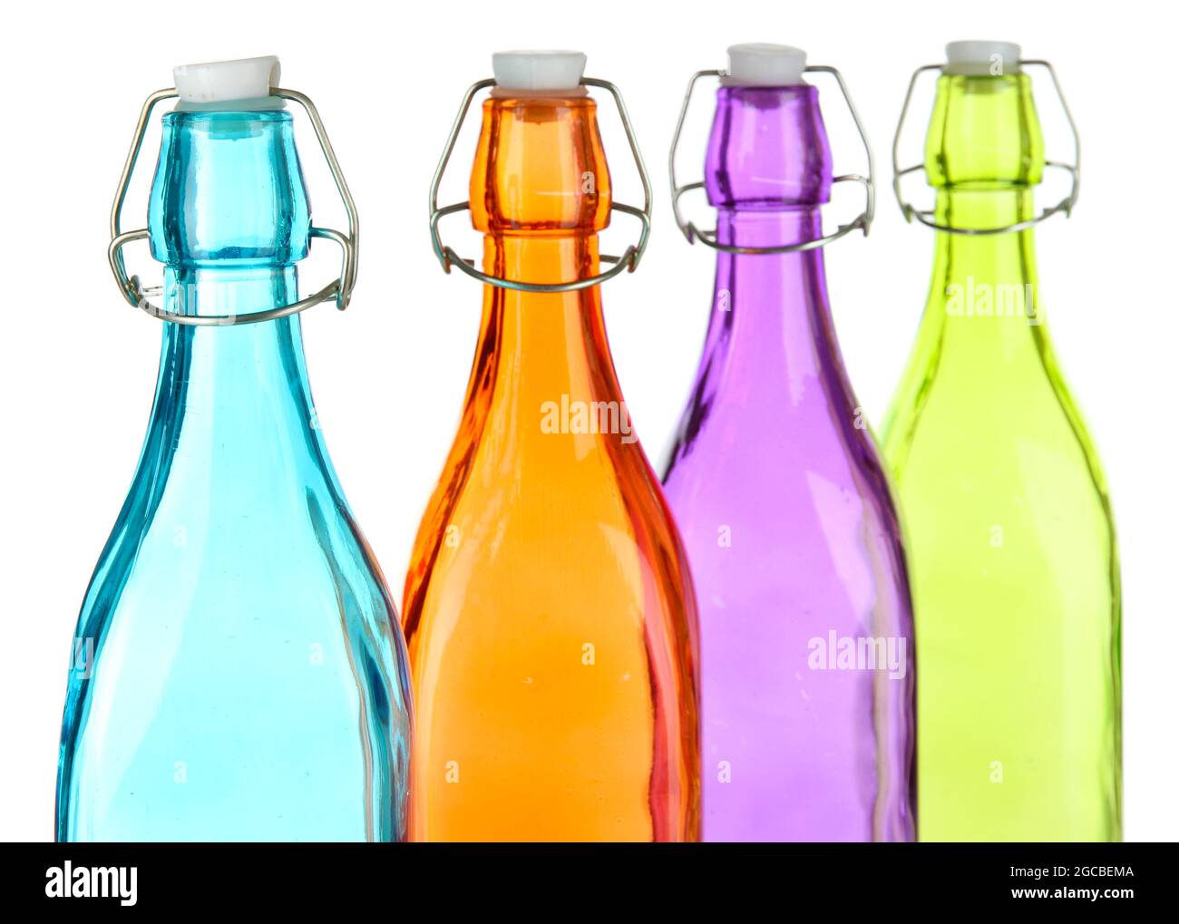 Colorful bottles isolated on white Stock Photo - Alamy