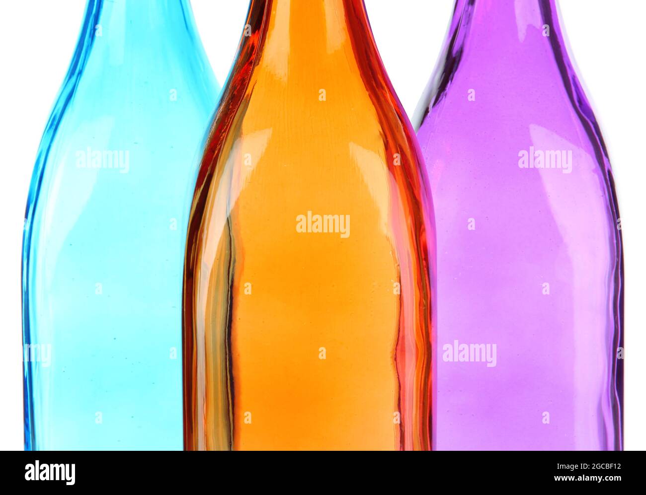 Colorful bottles isolated on white Stock Photo - Alamy