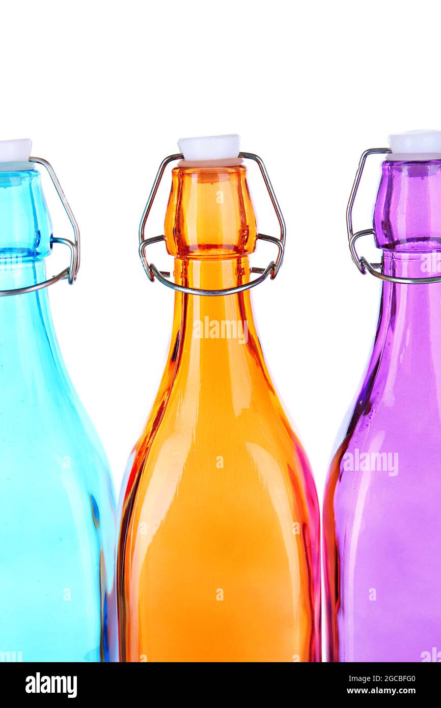 Colorful bottles isolated on white Stock Photo - Alamy
