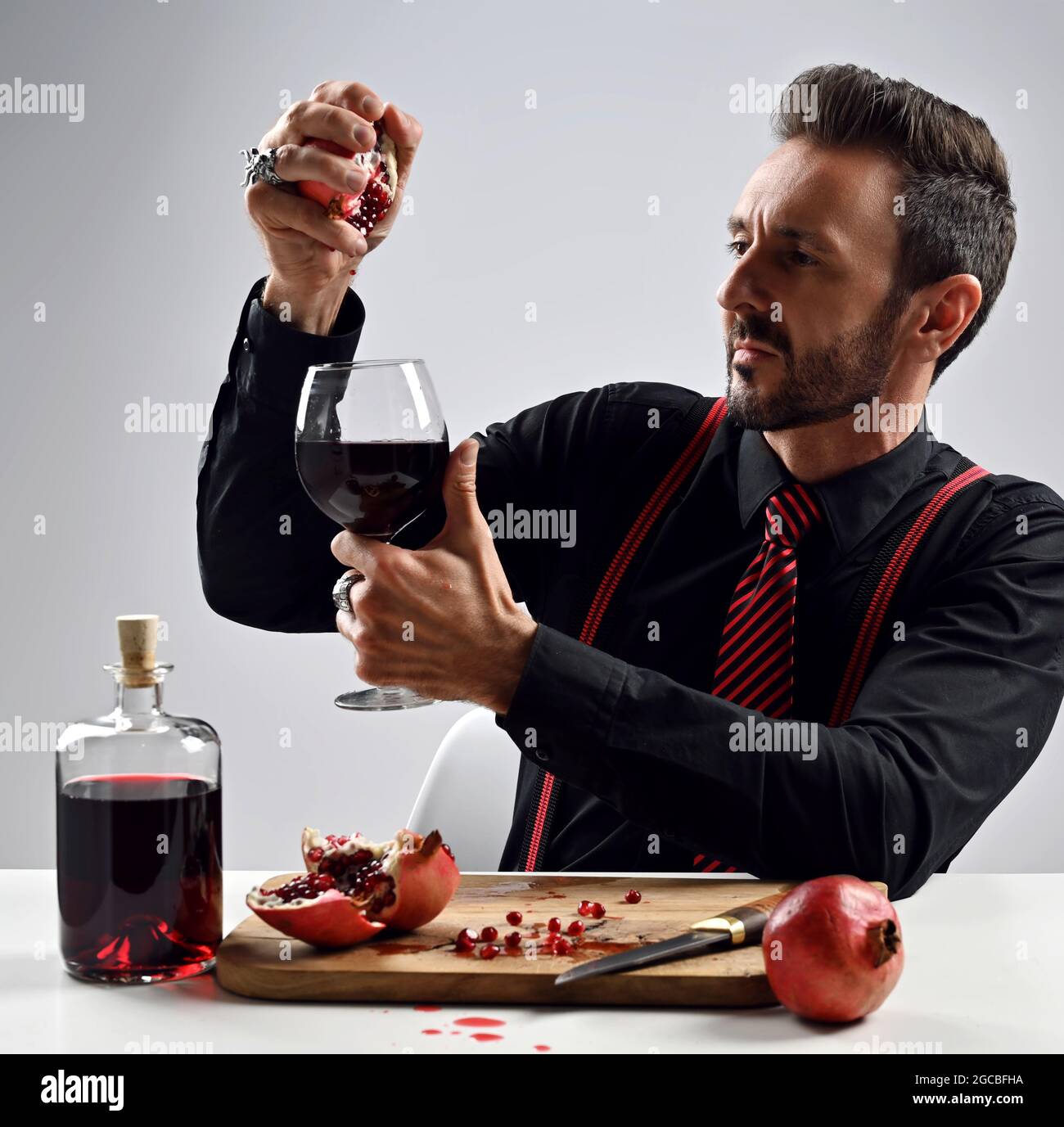 Portrait young man squeezing face hi-res stock photography and images ...