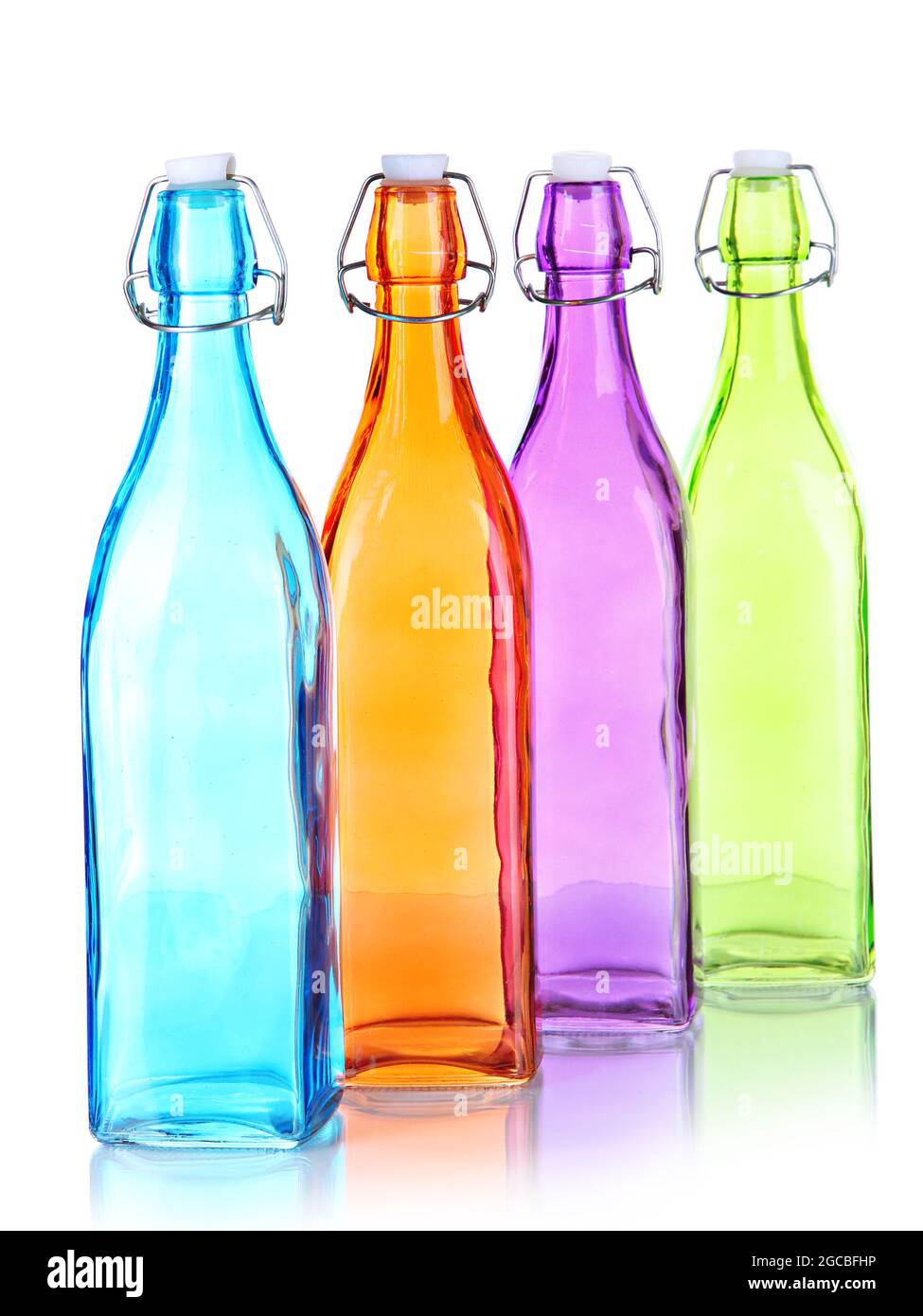 Colorful bottles isolated on white Stock Photo - Alamy