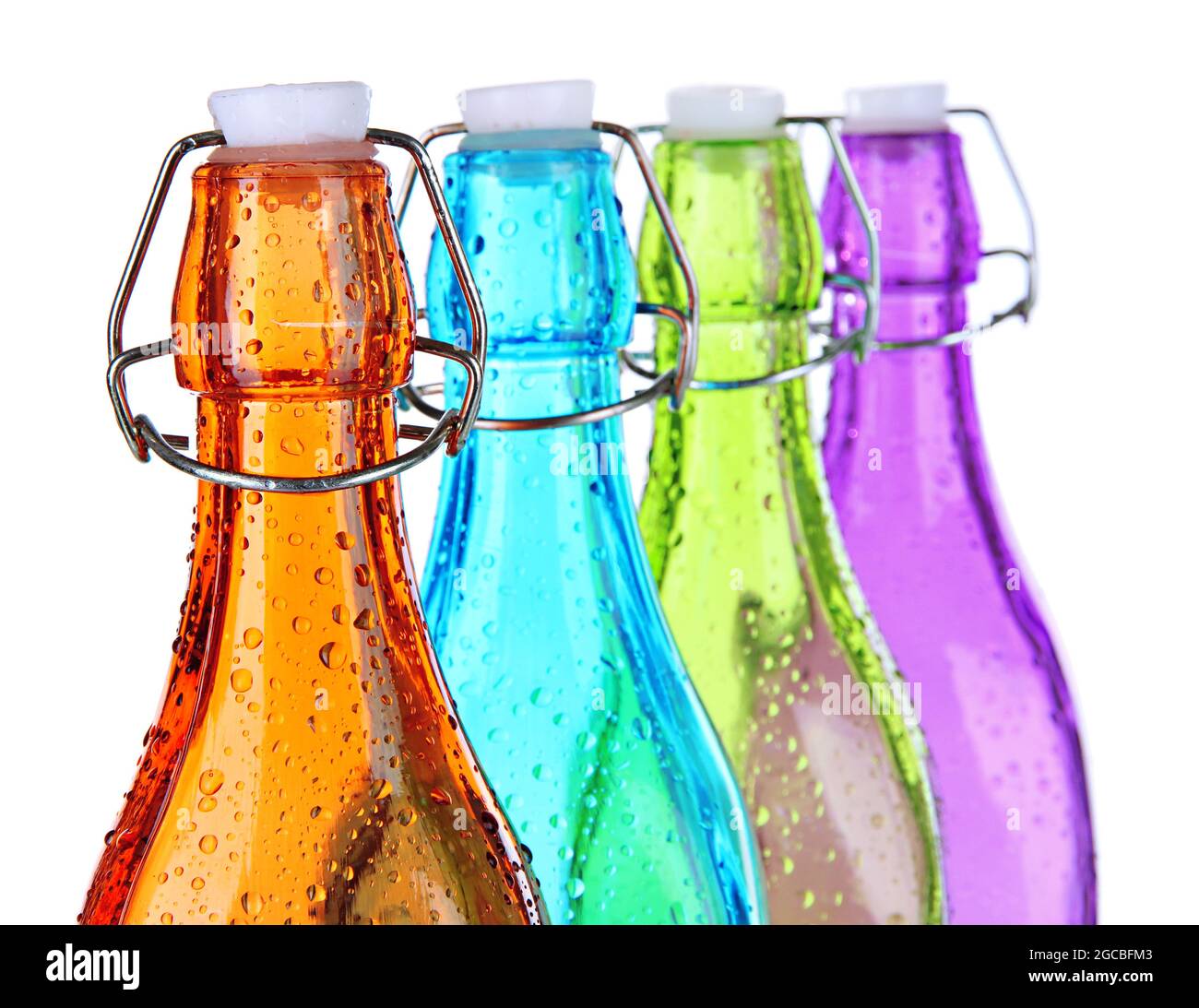 Colorful bottles isolated on white Stock Photo - Alamy