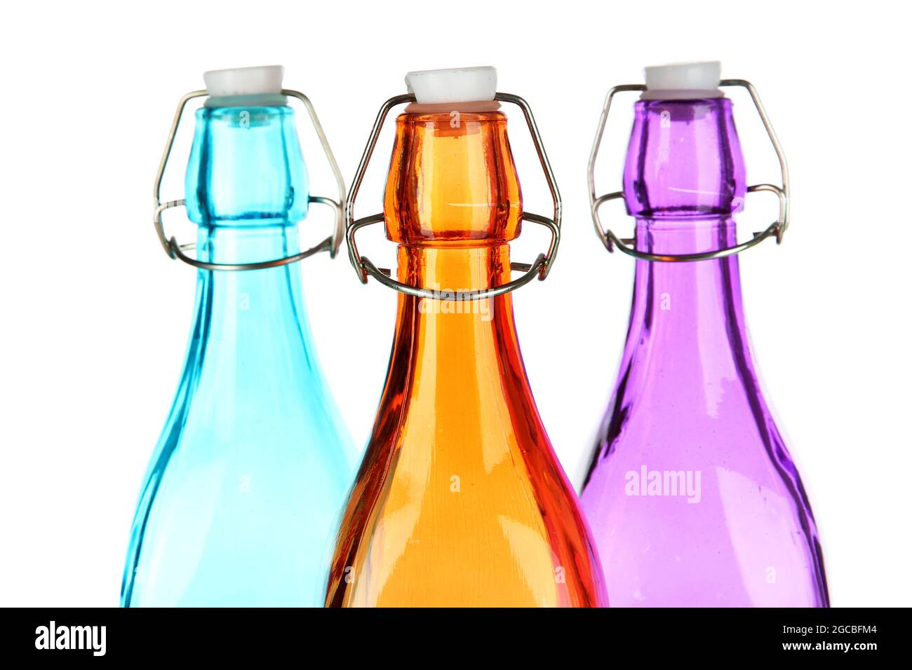 Colorful bottles isolated on white Stock Photo - Alamy