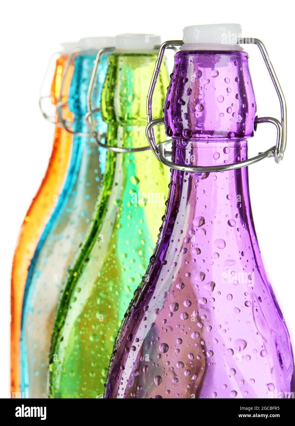 Colorful bottles isolated on white Stock Photo - Alamy