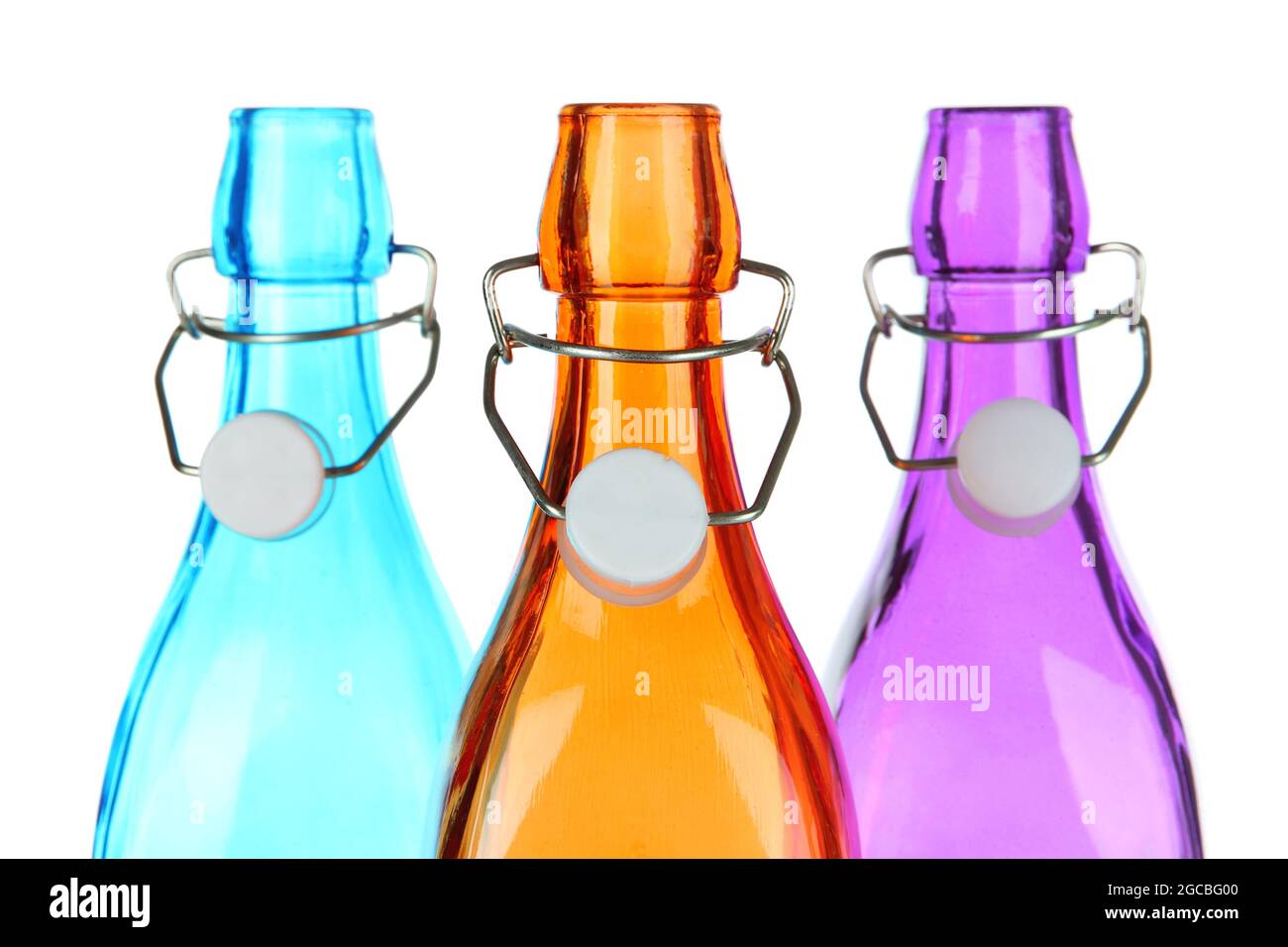 Colorful bottles isolated on white Stock Photo - Alamy