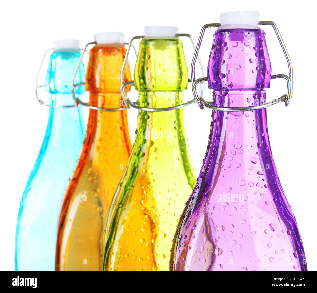 Colorful bottles isolated on white Stock Photo - Alamy