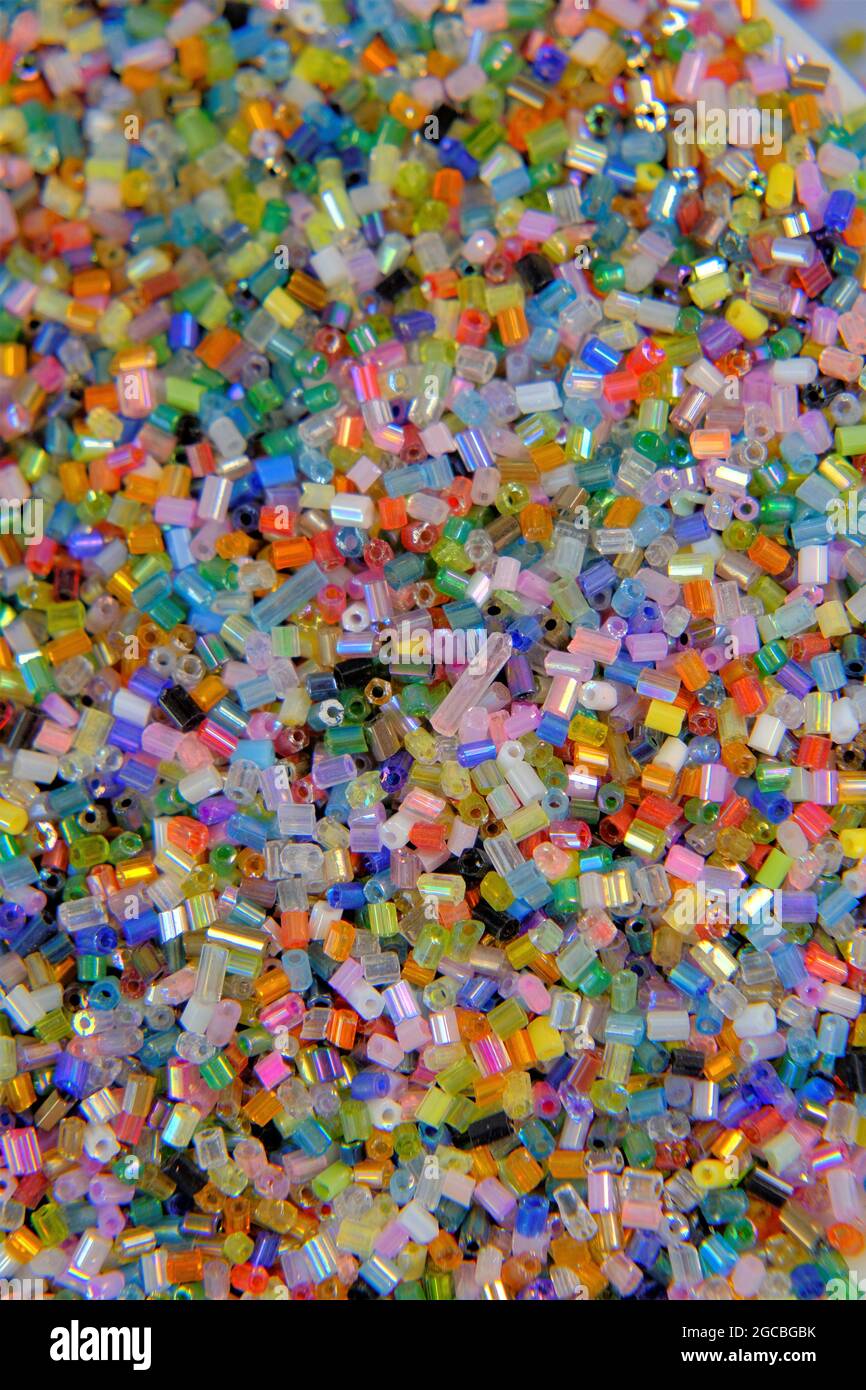 colorful beads background. Shiny variegated beads surface.Handicraft ...