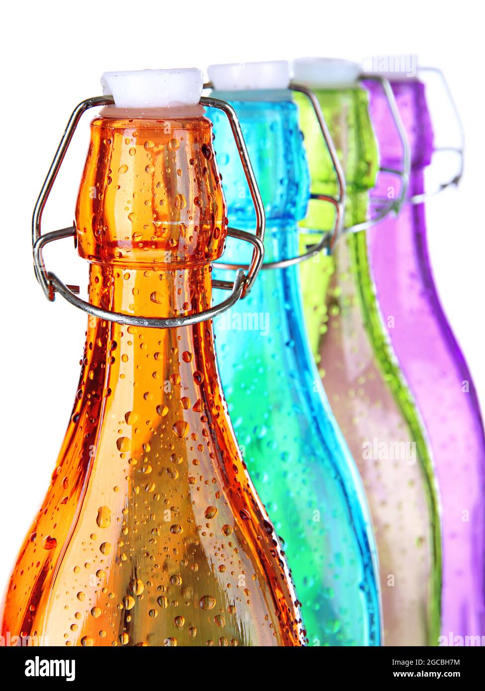 Colorful bottles isolated on white Stock Photo - Alamy