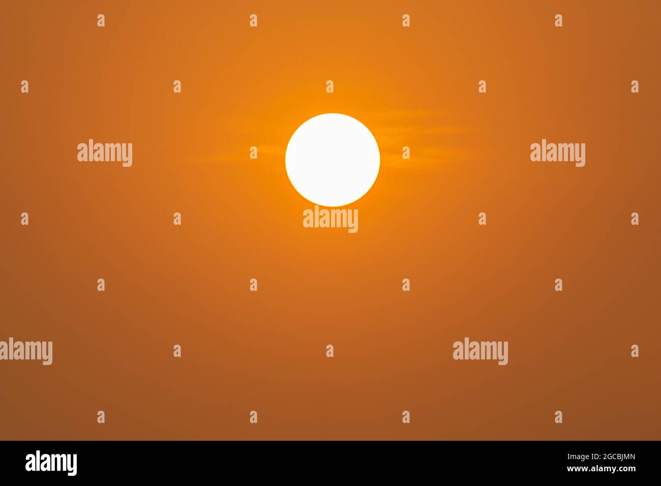 the sun on orange sky nature background Stock Photo - Alamy