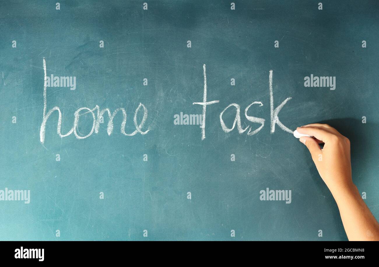 Writing on blackboard Stock Photo - Alamy