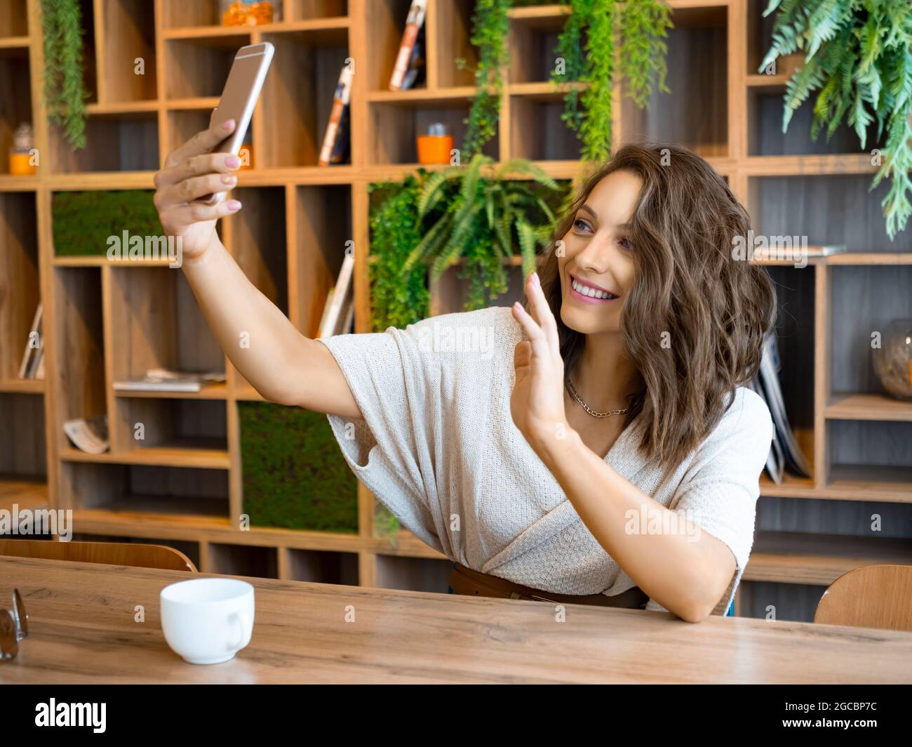 Photo of a young woman during online video call. Online meeting with ...