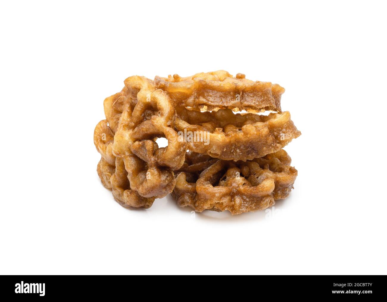 Pile of delicious sweet fried oil cake on isolated white background ...