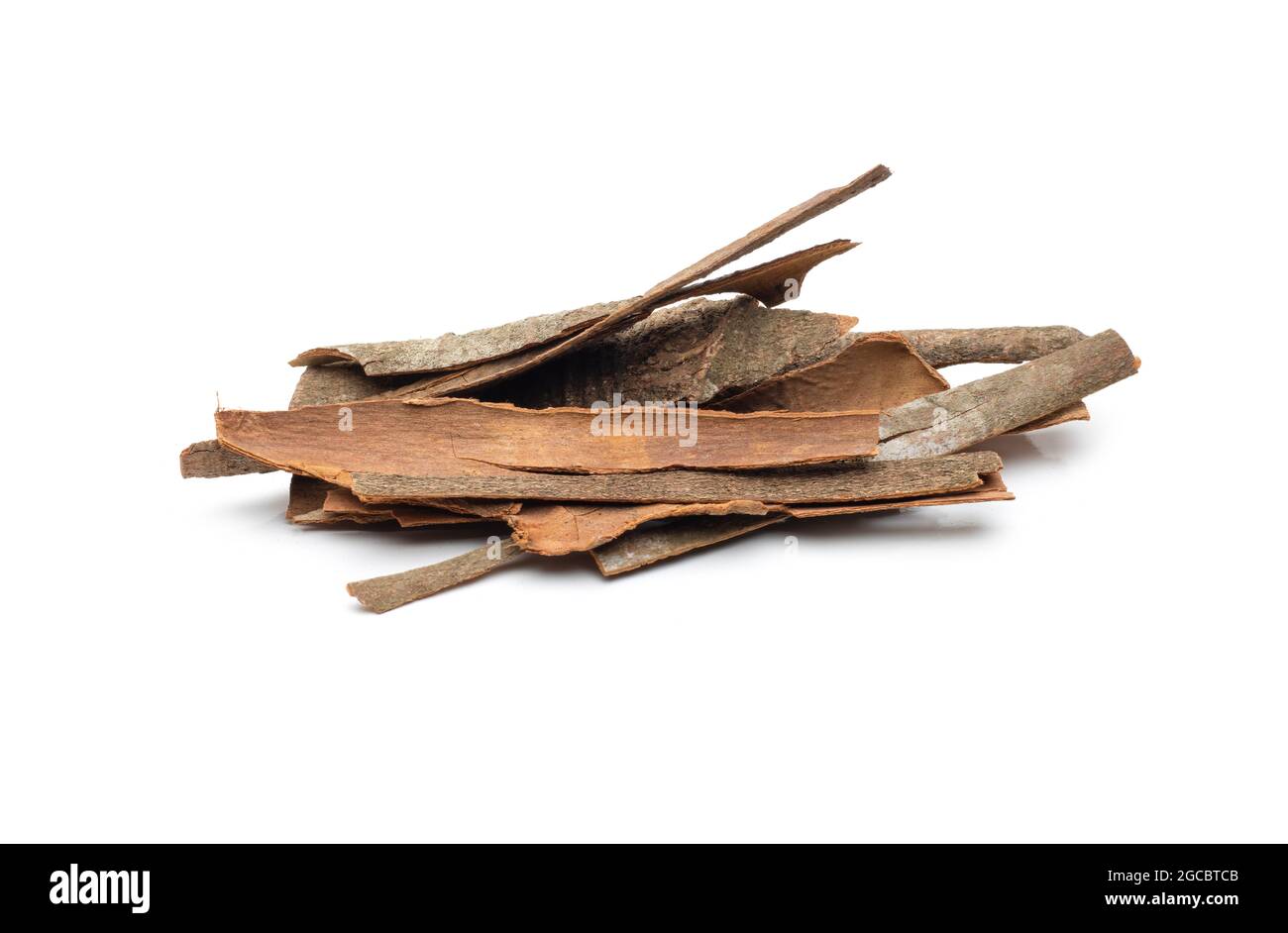 Spicy cinnamon bark close up on isolated white background Stock Photo ...